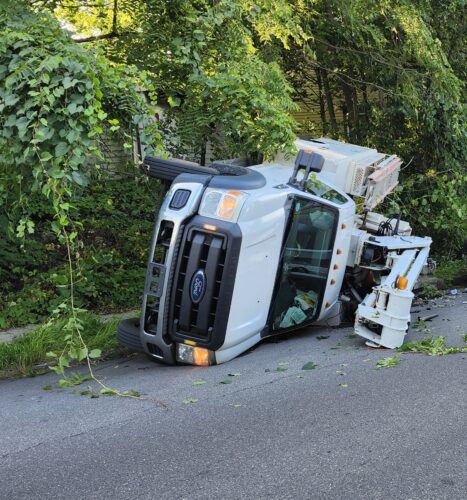 Utility worker not injured when truck overturns in Williamsport | News ...